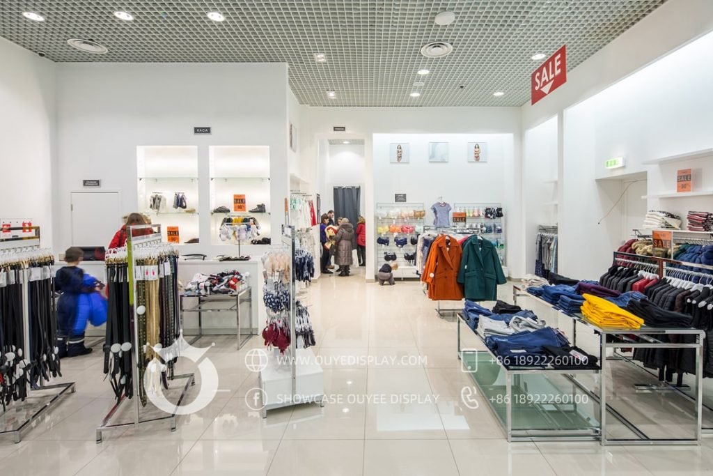 Clothing shop layout design Trend Apparel Display Racks